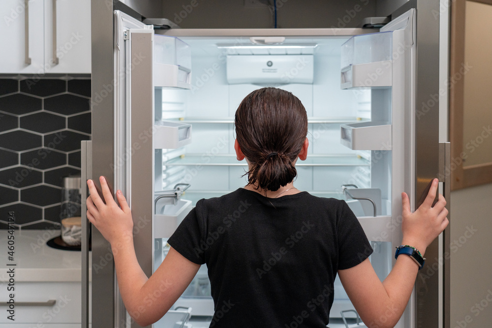 child from behind looking empty fridge no food concept idea Stock Photo ...