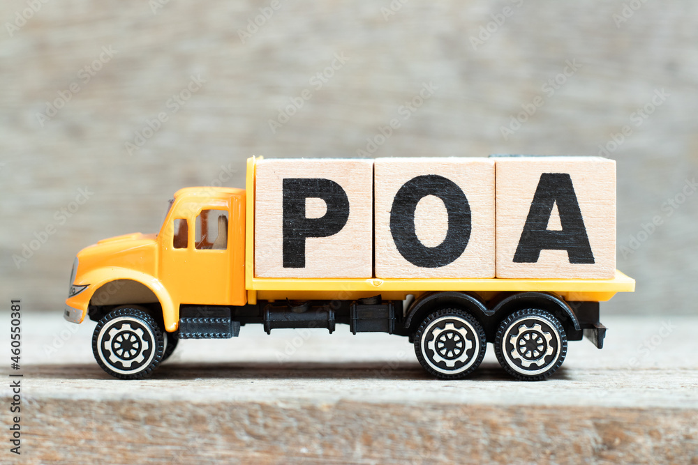 Toy truck hold alphabet letter block in word POA (Abbreviation of Plan ...