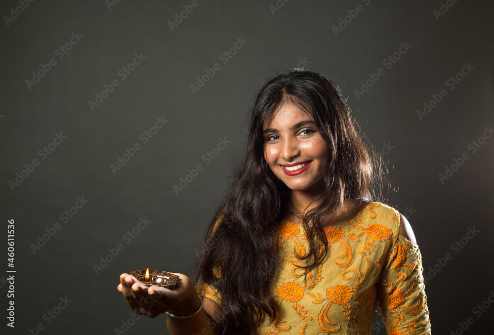 Beautiful Indian Girl in indian Traditional dress holding Diwali diya ...