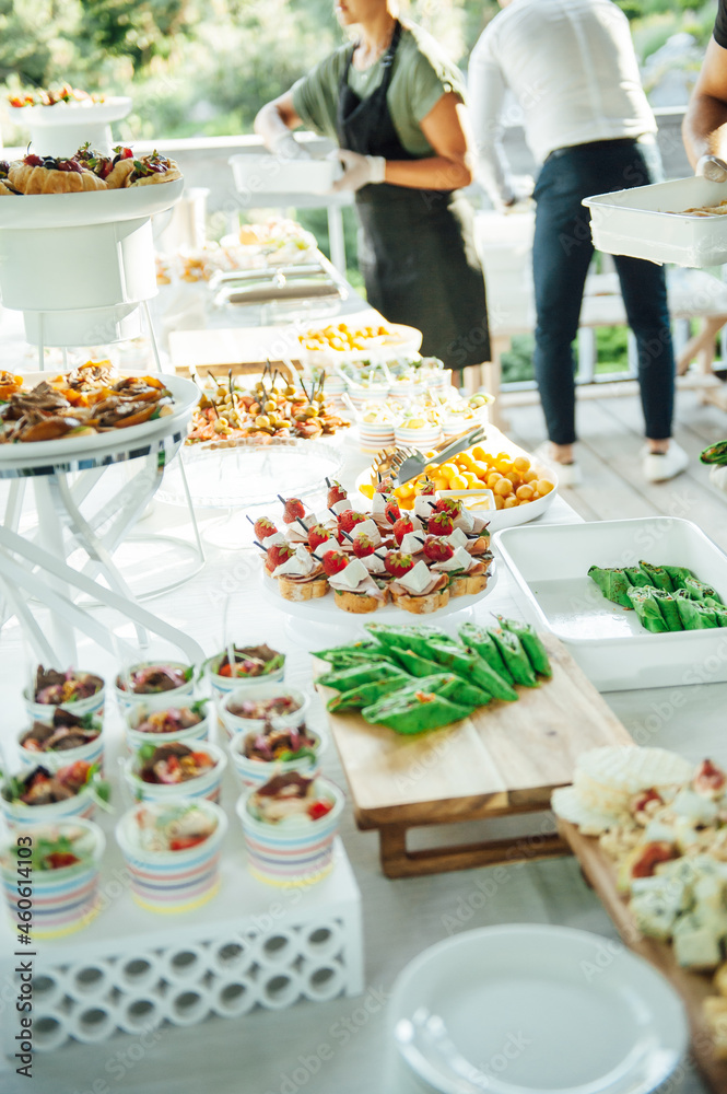 Buffet table of reception with cold snacks, meat and salads Stock Photo ...