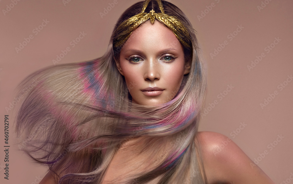 Beautiful girl with multi-colored hair and creative make up and ...