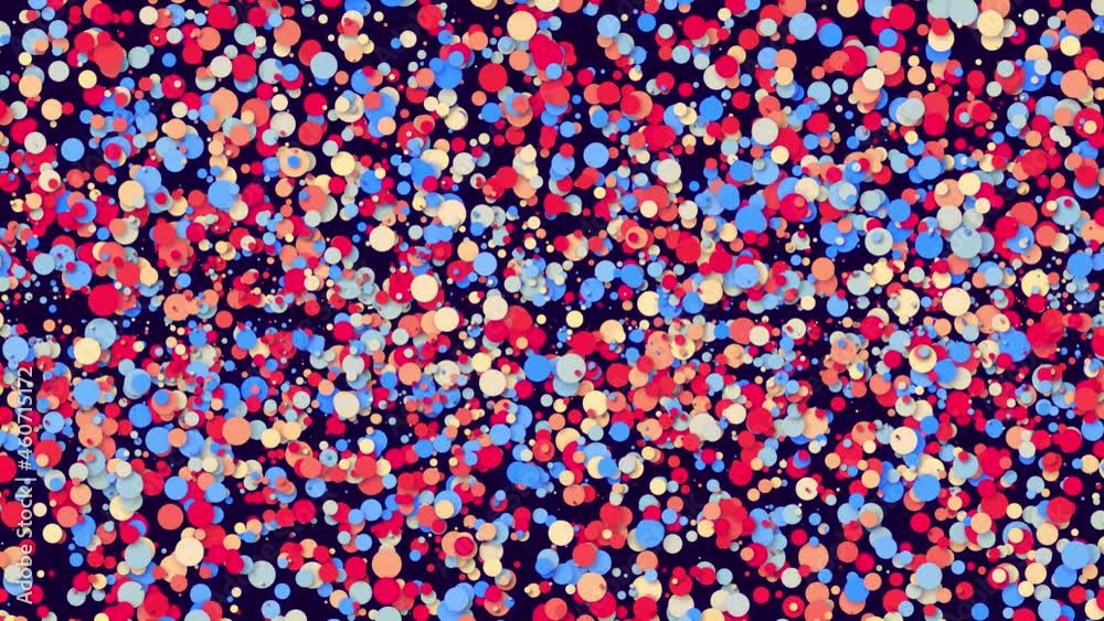 Wall of particles. Multicolored round particles fly from emitter on ...