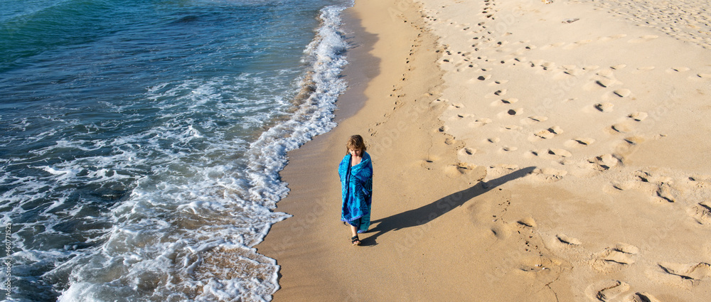 Kid boy walking at tropical beach. Child on the beach on summer ...