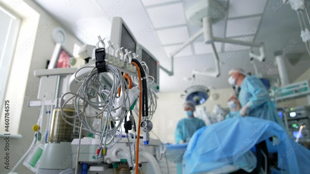 Contemporary medical system in the operating room. Monitor and machine ...