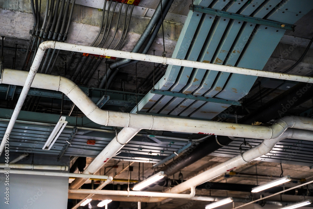 Electrical conduits system and metal pipeline installed on building ...