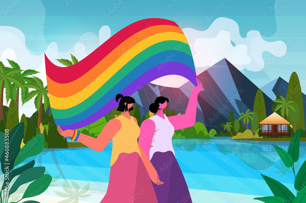 lesbian couple holding rainbow flag transgender love LGBT community ...