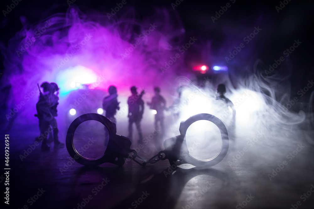 Police raid at night and you are under arrest concept. Silhouette of ...