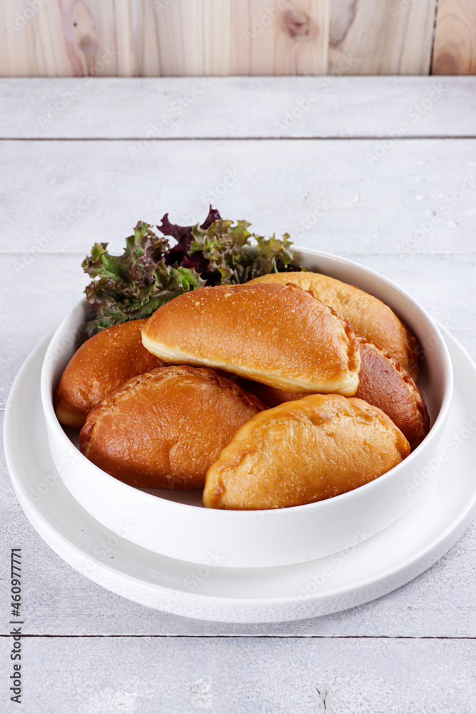 Panada is a fried bread filled with spicy tuna, a traditional snack ...