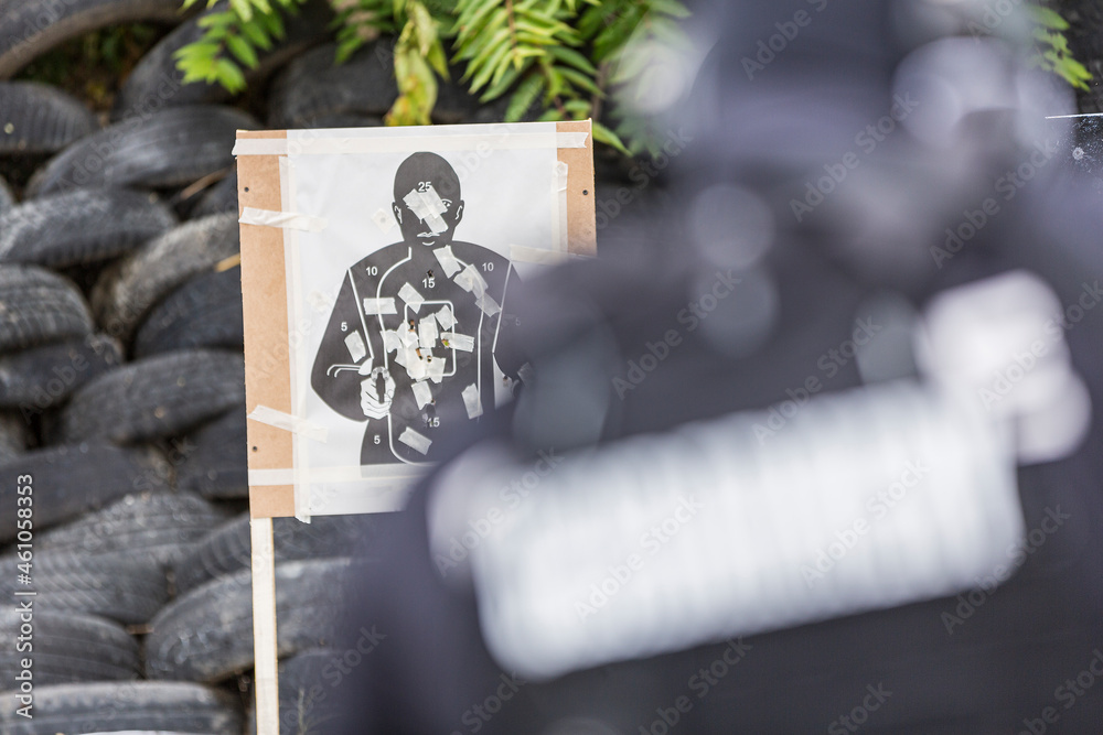 automatic weapon, pistol in the hands of a well-equipped and trained ...