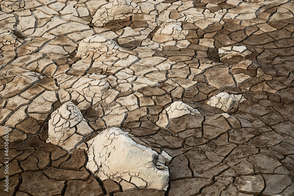 Cracked soil texture on ground field. Shortage of rainfall gradually ...