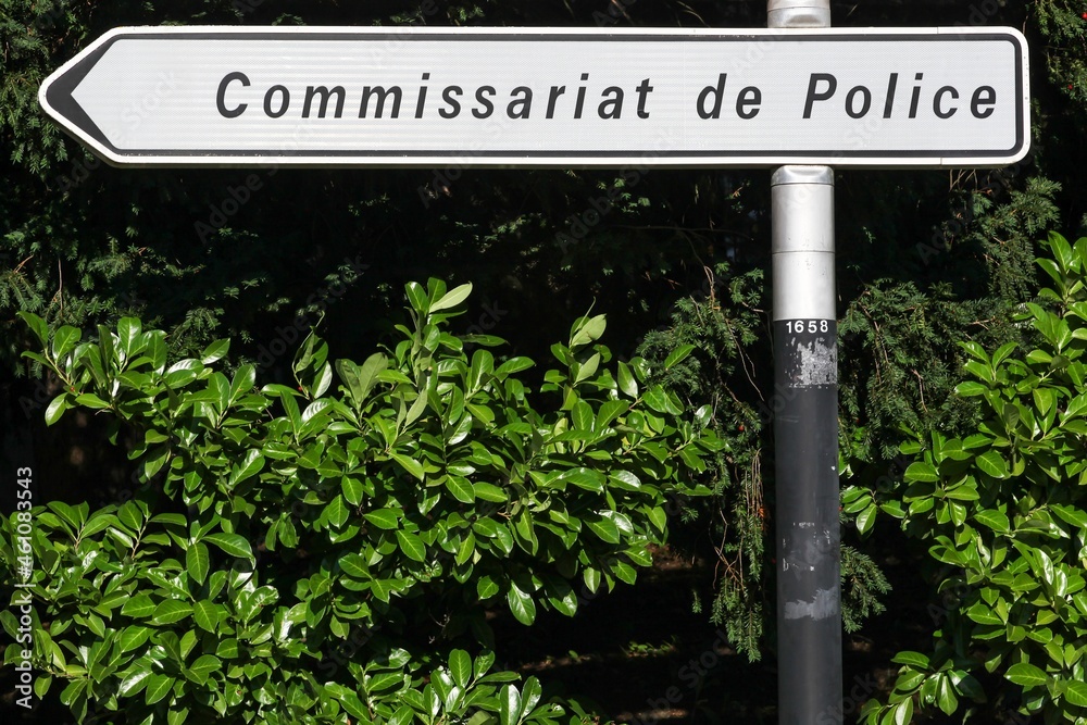 Police station road sign and direction in France called commissariat de ...