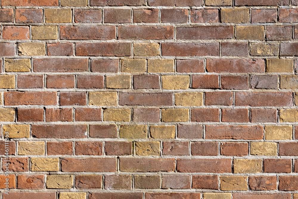 Red / yellow brick wall background Stock Photo | Adobe Stock
