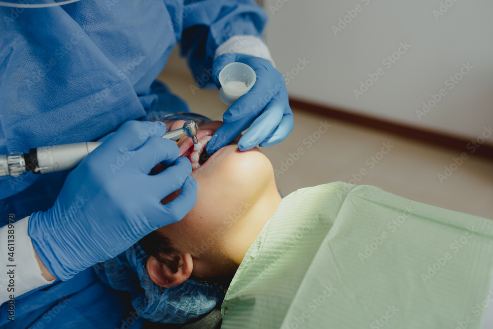 Dentist making a dental check Stock Photo | Adobe Stock