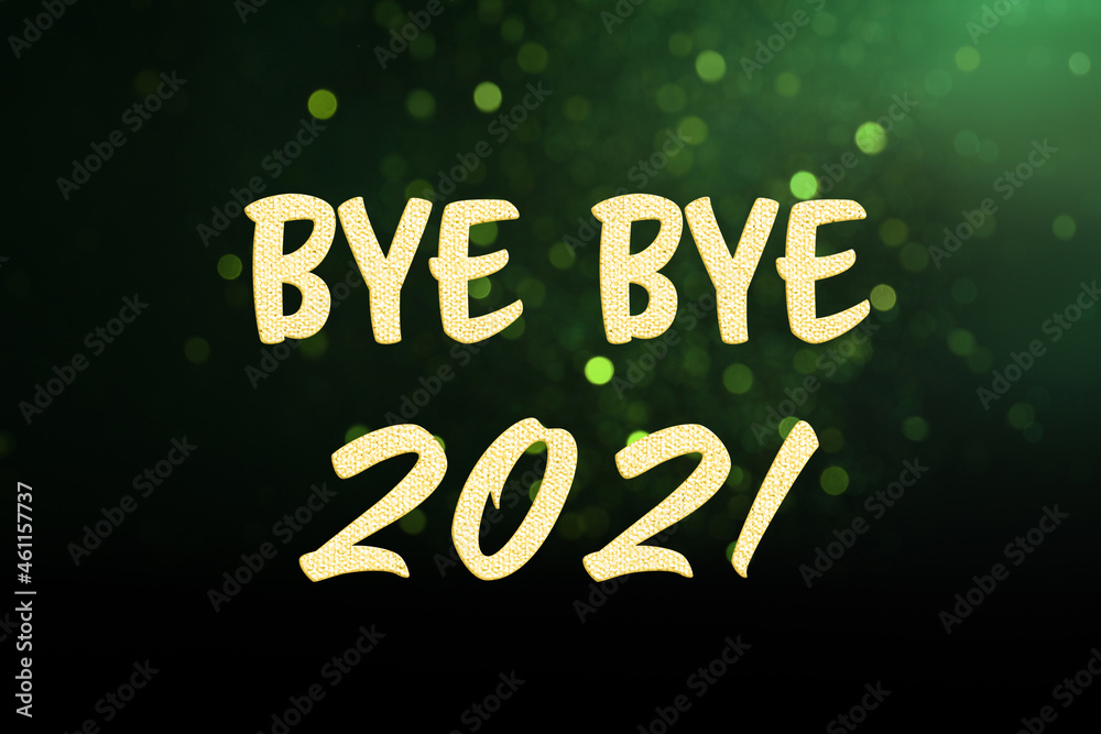 Phrase Bye Bye 2021 on green background with blurred festive lights ...
