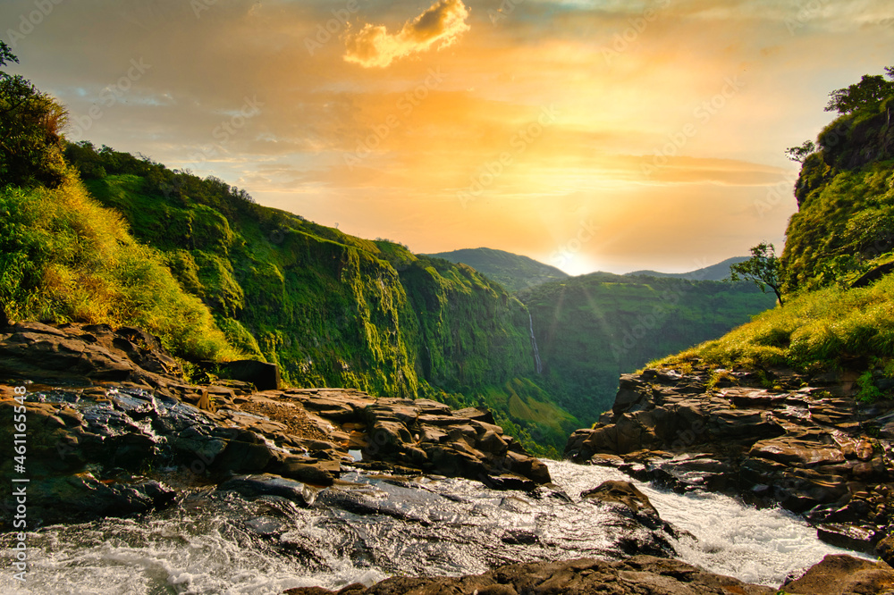 Beautiful waterfall with dramatic sky, somewhere in the Sahyadri ranges ...