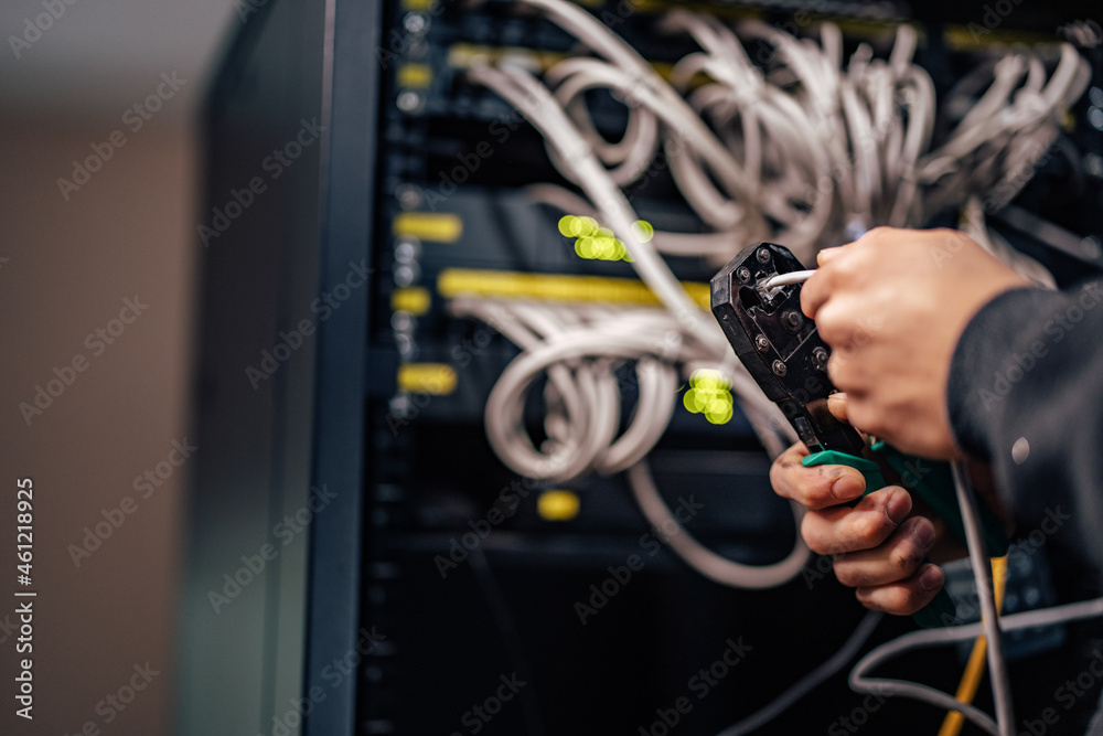 Computer network laying procedure. Installing a new connector on ...