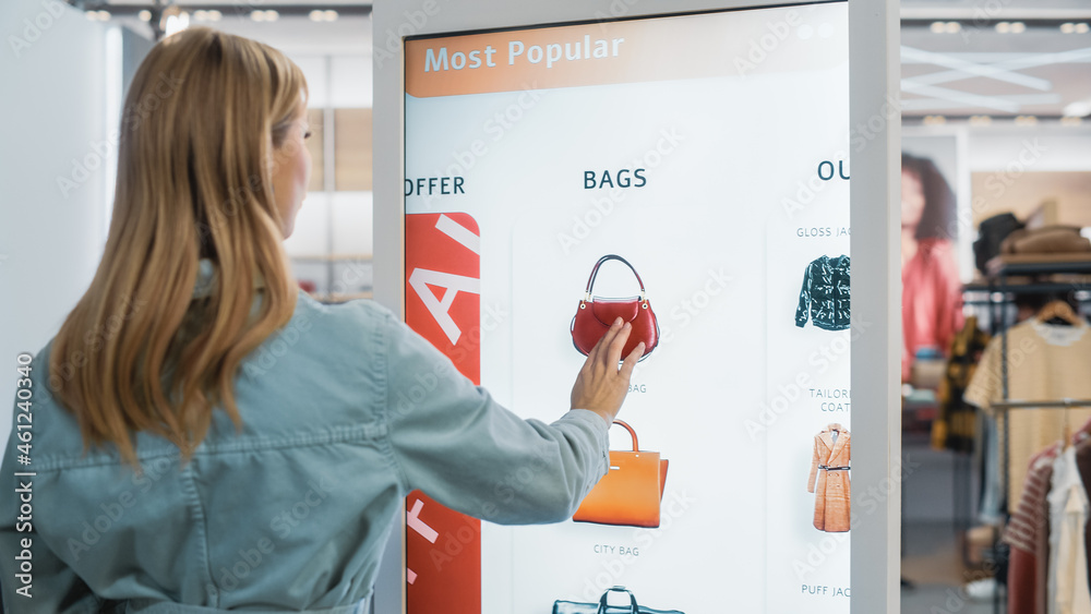 Beautiful Female Customer Using Floor-Standing LCD Touch Display while ...
