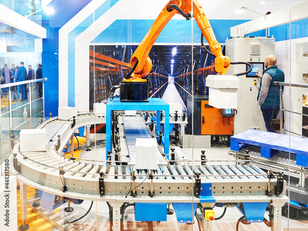 Robot palletizer for stacking boxes Stock Photo | Adobe Stock