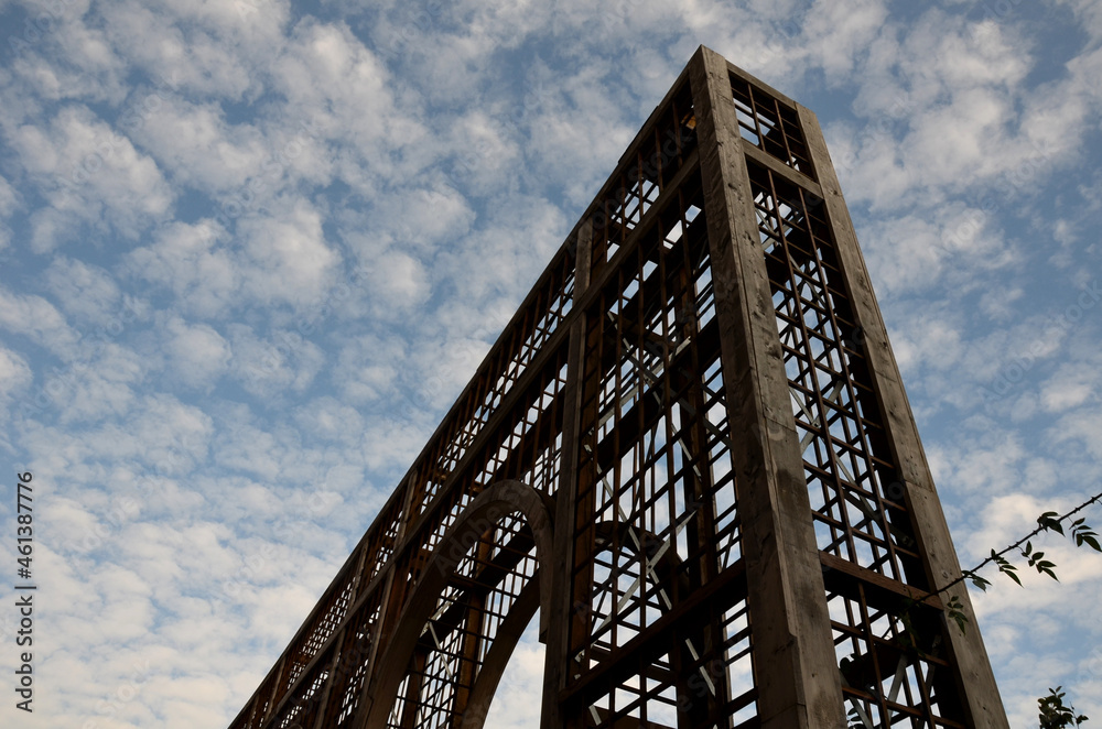 trellises on plants in the shape of an arch bridge. wooden wooden ...