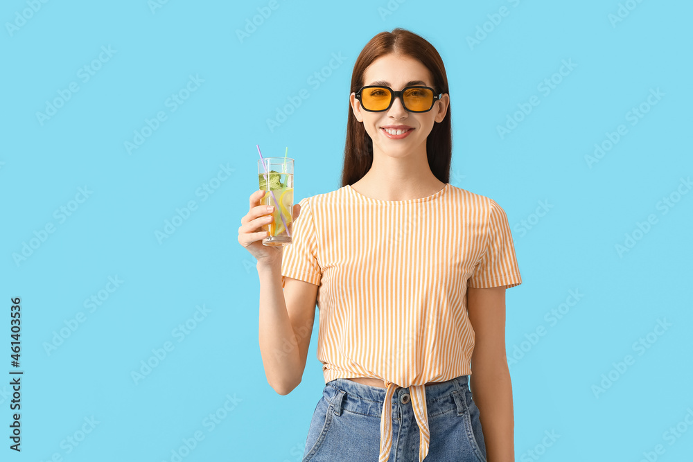 Beautiful young woman with fresh lemonade on color background Stock ...