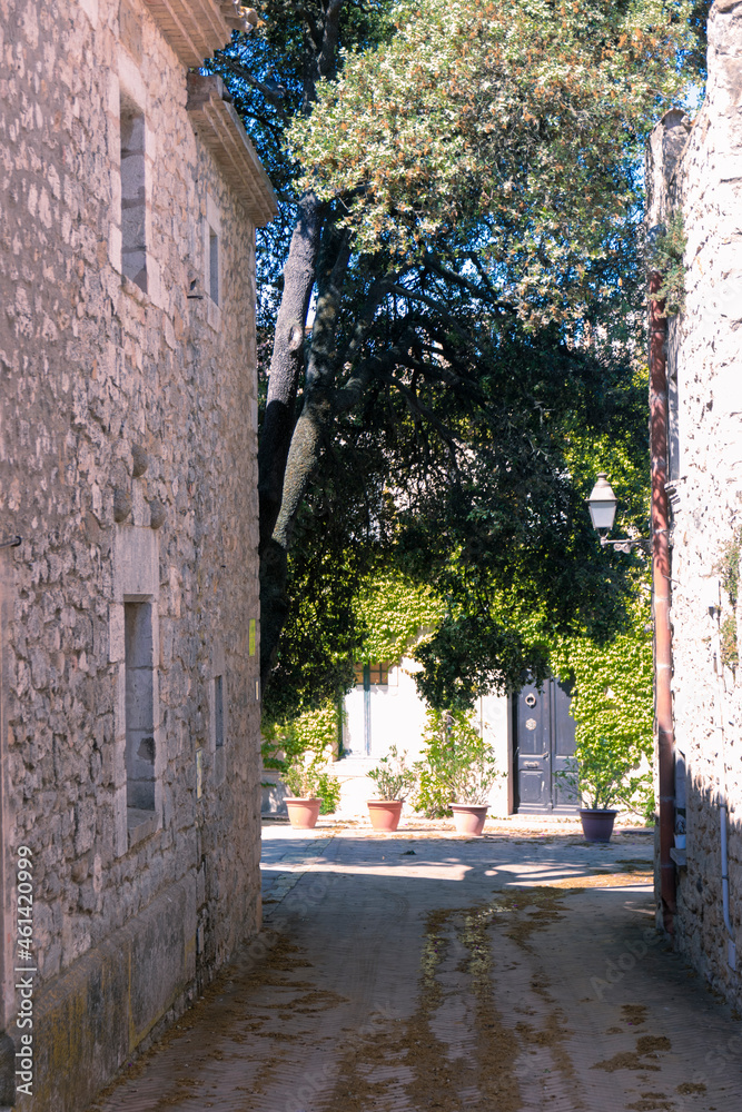medieval alley in the town of la escala, on the costa brava Stock Photo ...