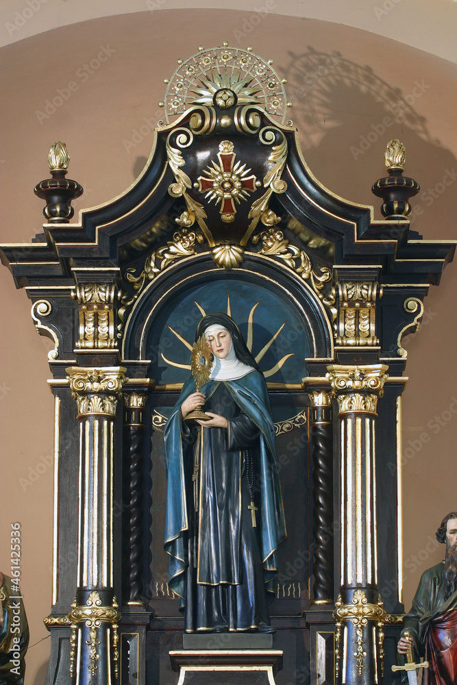 Saint Clare statue on the main altar in the church of St. Clare of ...