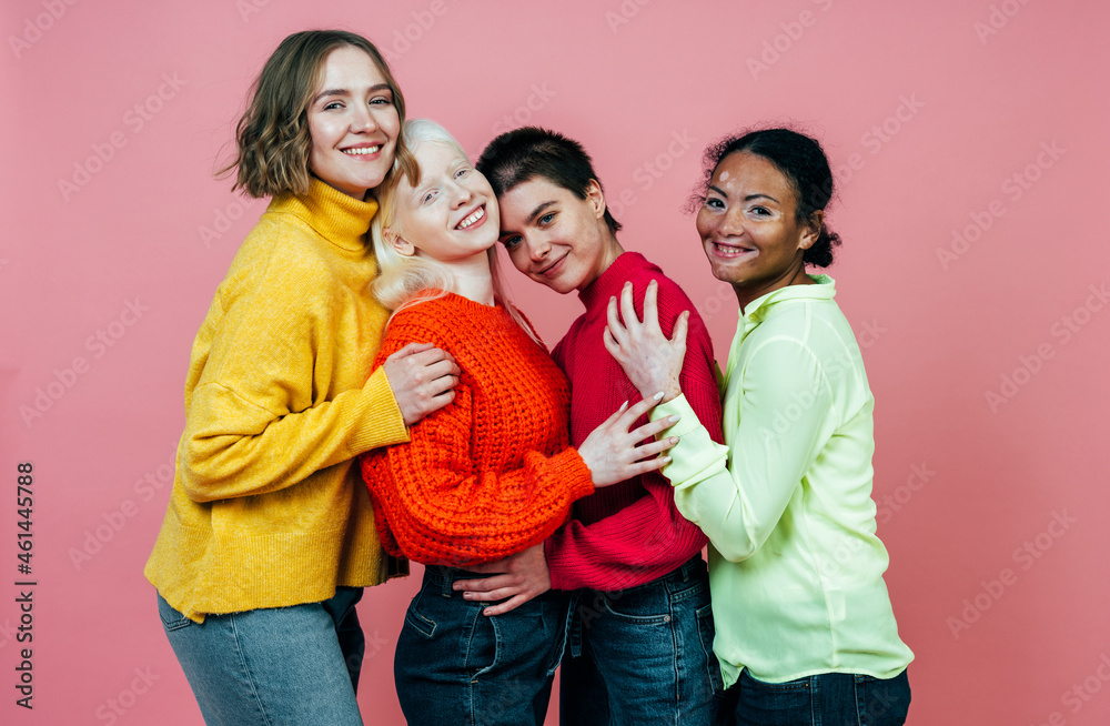 group of multiethnic women with different kind of skin posing together ...