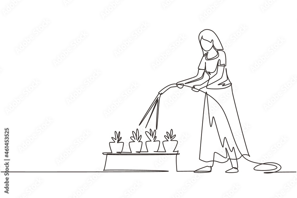 Continuous one line drawing young woman watering potted plants with ...