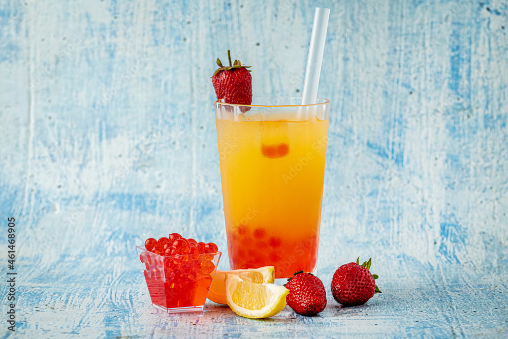 Lemonade with bubble tea on blue stone background Stock Photo | Adobe Stock