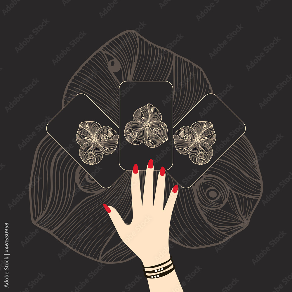 Hand with tarot cards, a layout of cards on the table, hand drawing an ...