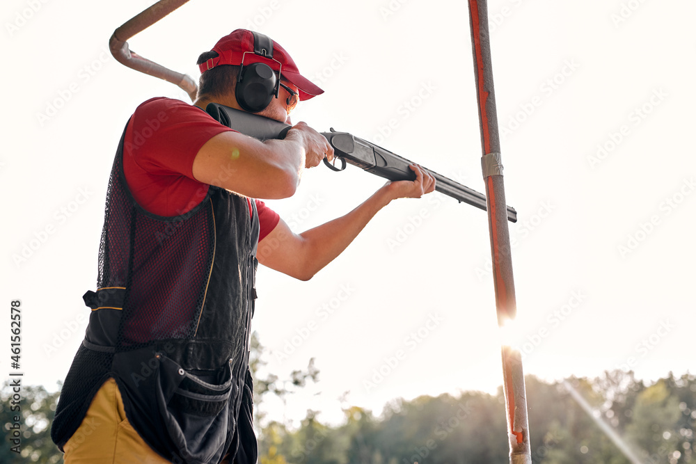 Side View on Young Caucasian Man wear Ear Plug Confidently Aiming ...