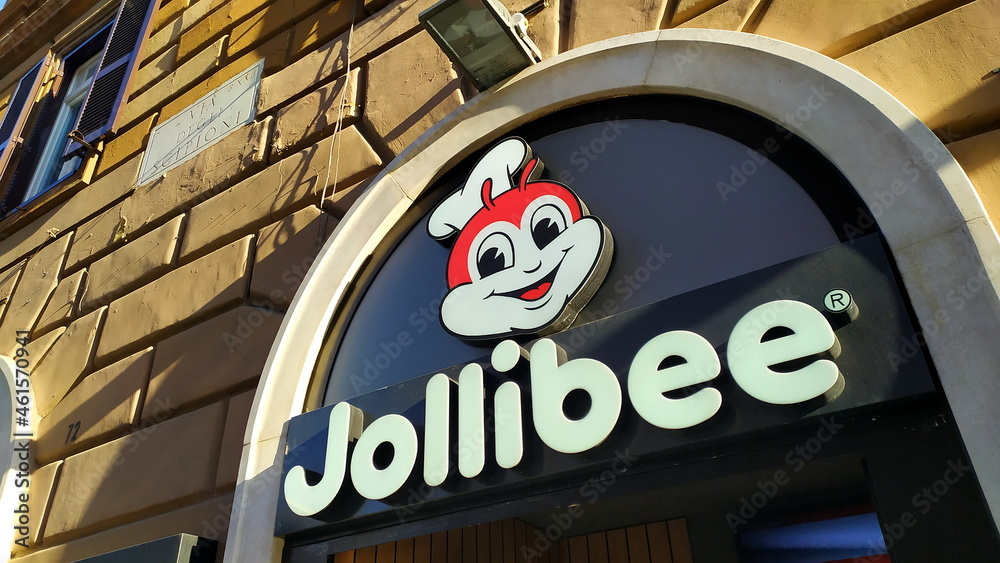 Sign of a Roman branch of the JOLLIBEE fast food chain. Filipino ...