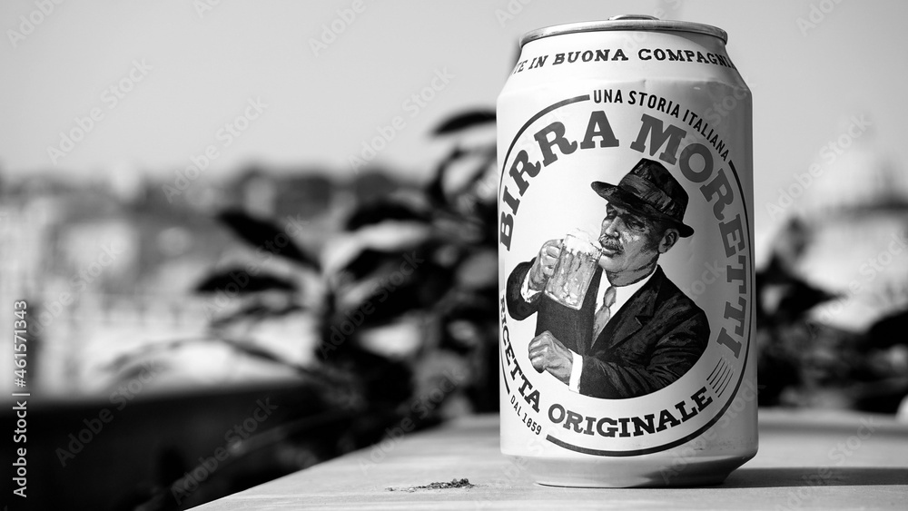 Rome, Italy - March 03, 2019: Can of Moretti beer on a low wall with a ...