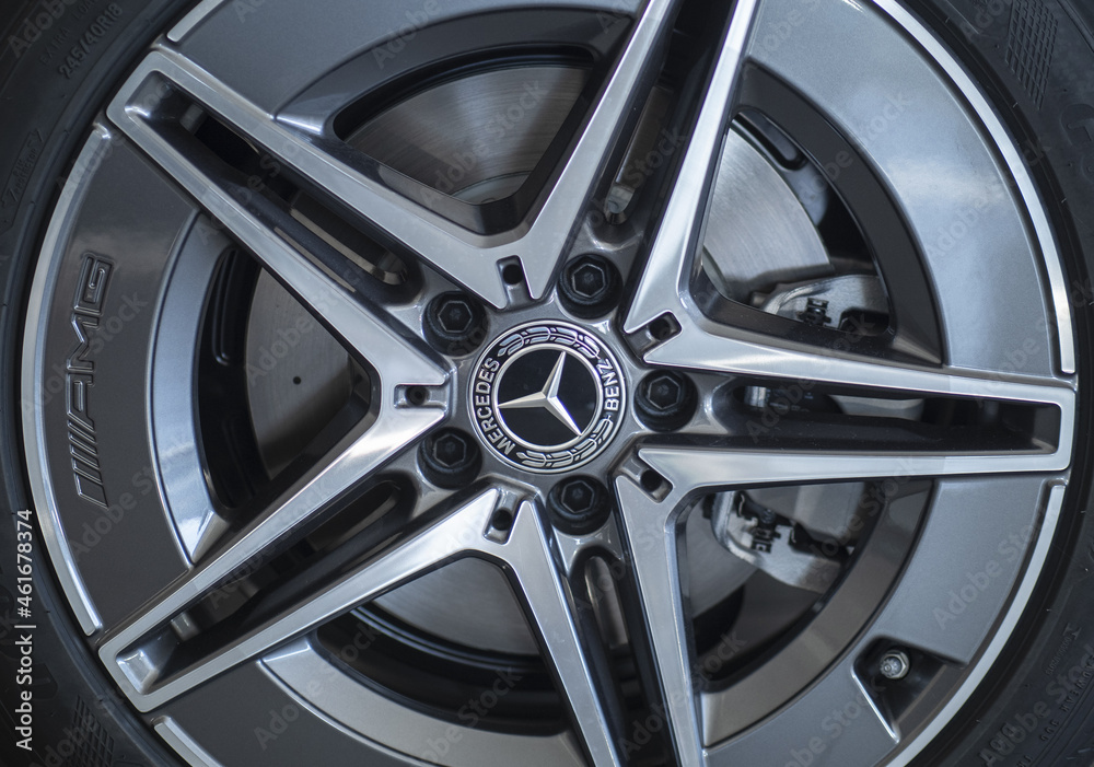 AMG alloy wheel with Mercedes logo in the center Stock Photo | Adobe Stock