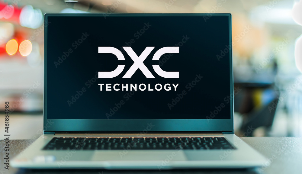 Laptop computer displaying logo of DXC Technology Stock Photo | Adobe Stock