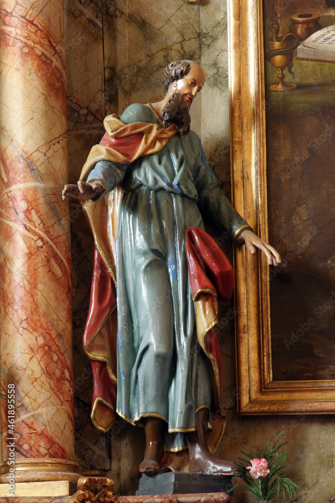 Statue of Saint on the main altar in the Church of St. John the Apostle ...