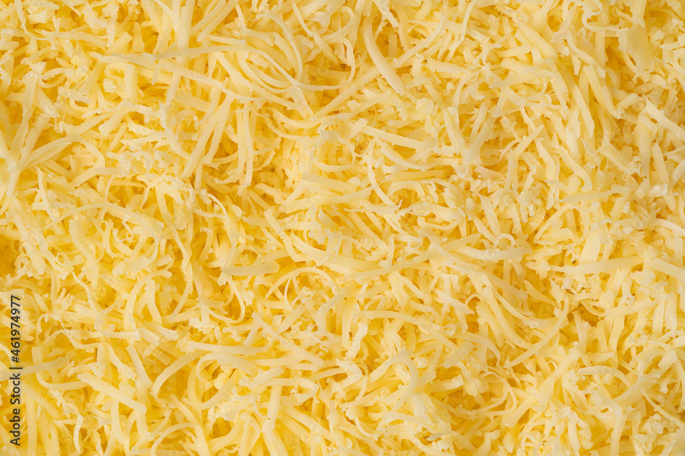 Grated cheese background texture. yellow shredded cheese. Close up top ...