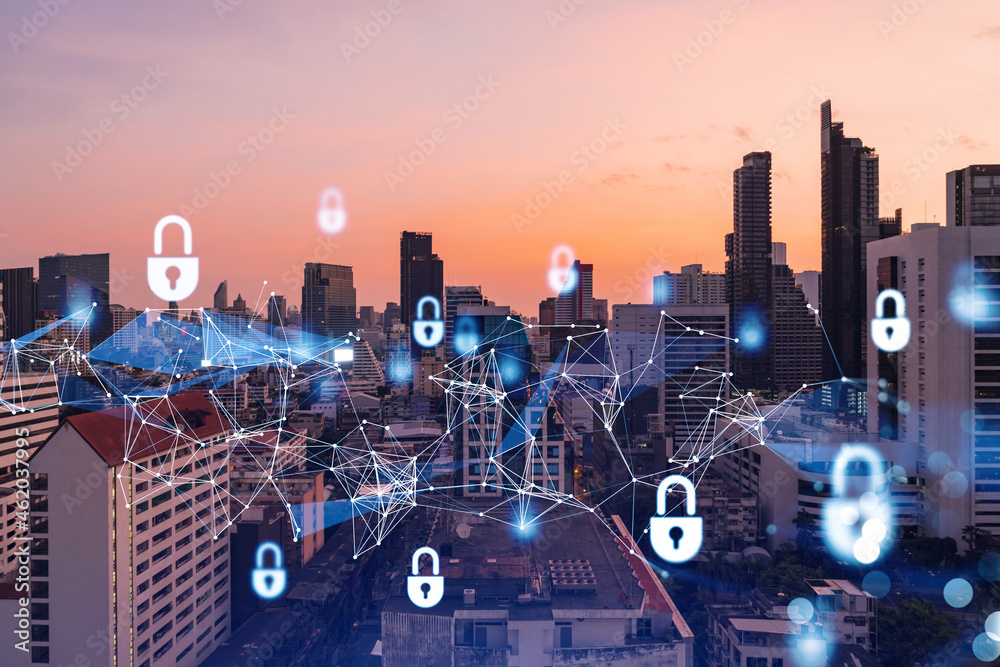 Hologram of Padlock on sunset panoramic cityscape of Bangkok, Southeast ...