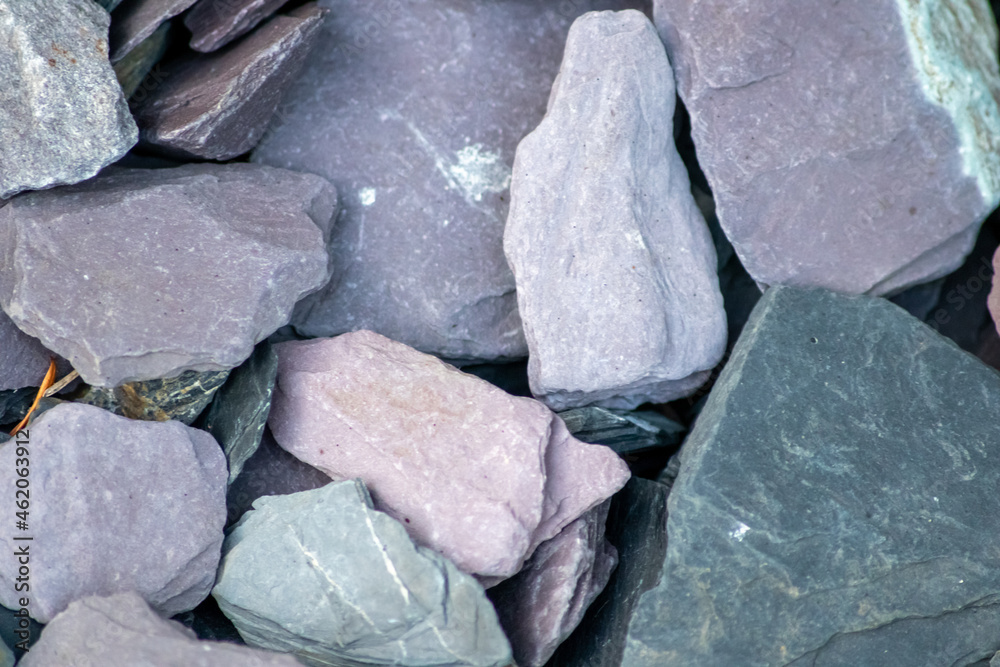 Raw rocks and minerals as natural stones background with crushed and ...
