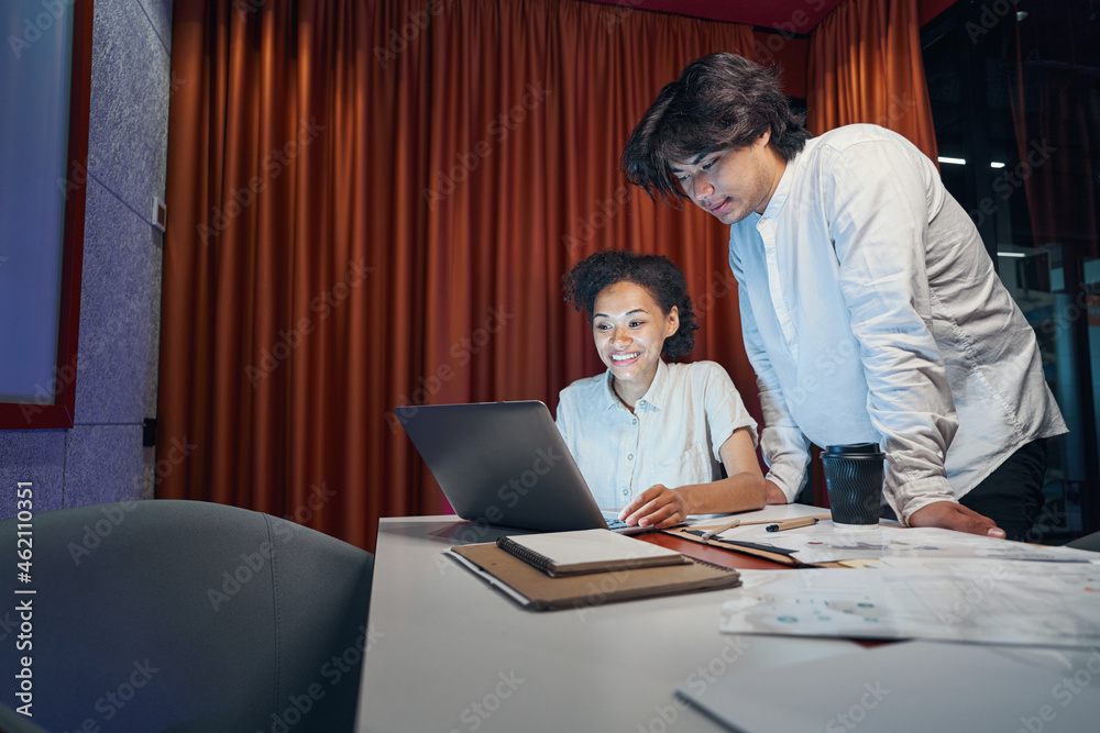 Female person preparing documents for presentation on laptop Stock ...
