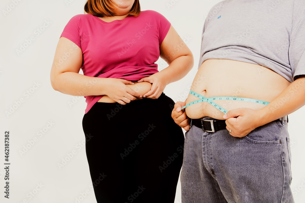 Couples with obese and obese sizes squeeze excessive waist and use a ...