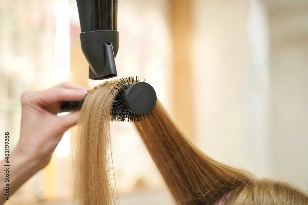 Repair long hair procedure. Haircut at salon. Woman hairstyle. Master ...