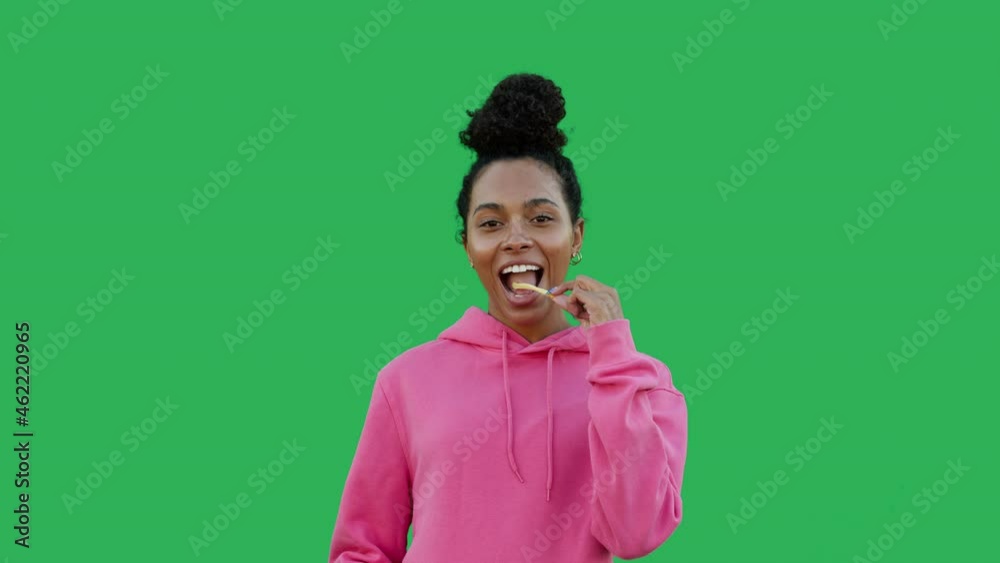 African american woman eating french fries potatoes enjoying junk food ...