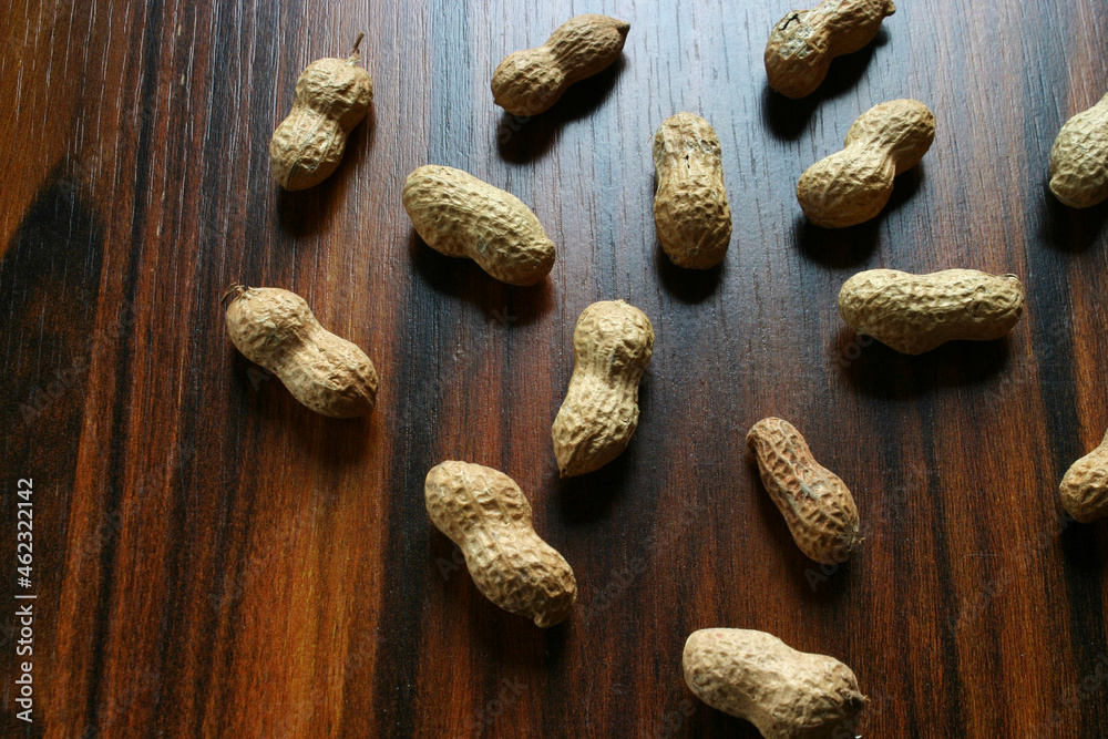 Peanuts. Peanuts in shell on the rustic table. Brazilian snacks. Stock ...