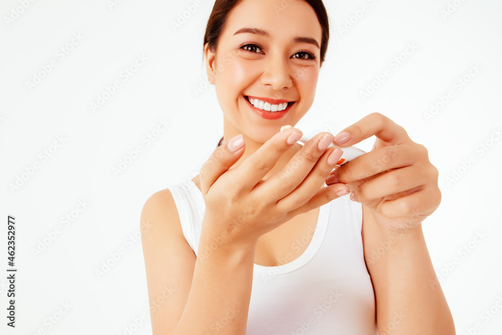 Asian young women care for their skin, using sunscreen lotion, to ...