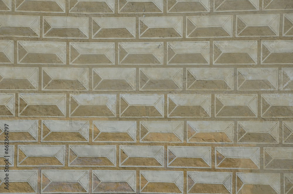 plaster of a renaissance chateau where a dark and light color emerges ...