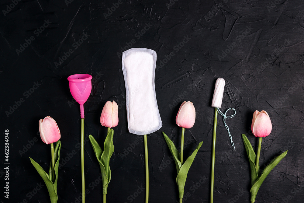 Different types of feminine hygiene products. Tampons, menstrual cup ...