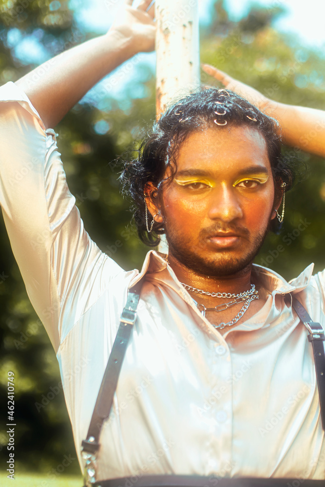 dreamy portrait of a dark skinned Indian man in Malaysia, with make up ...