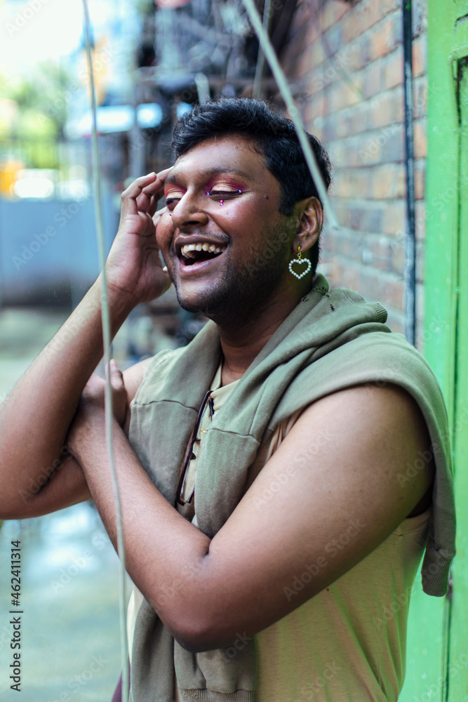 portrait of dark skinned Indian man in Malaysia, with theatrical facial ...