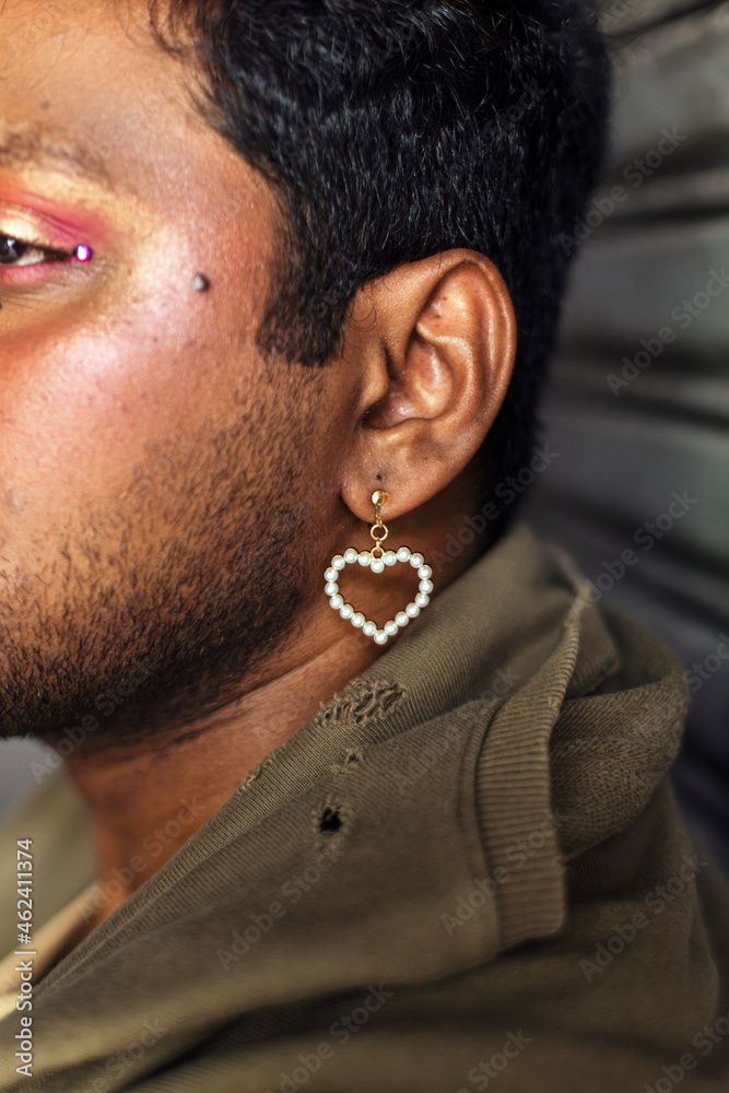 portrait of dark skinned Indian man in Malaysia, with theatrical facial ...